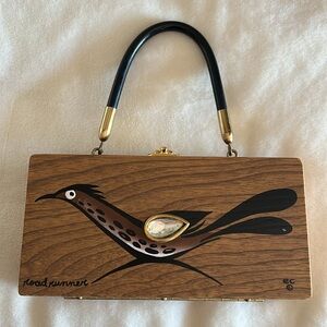 Enid Collins - Poshmark